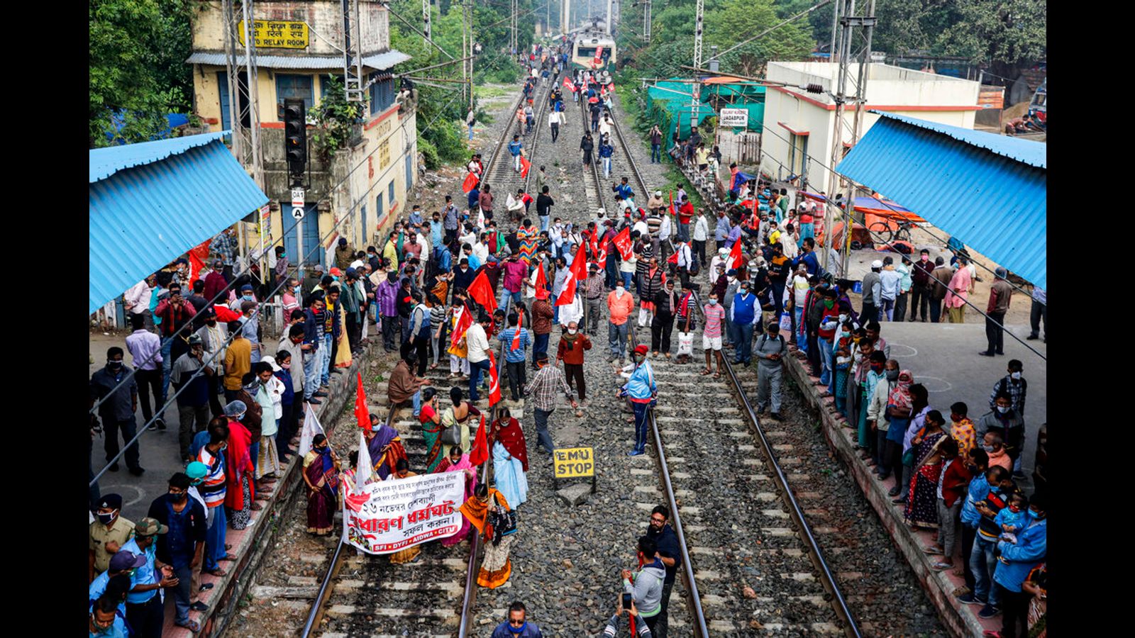 Millions of Indian workers join national general strike against Modi ...