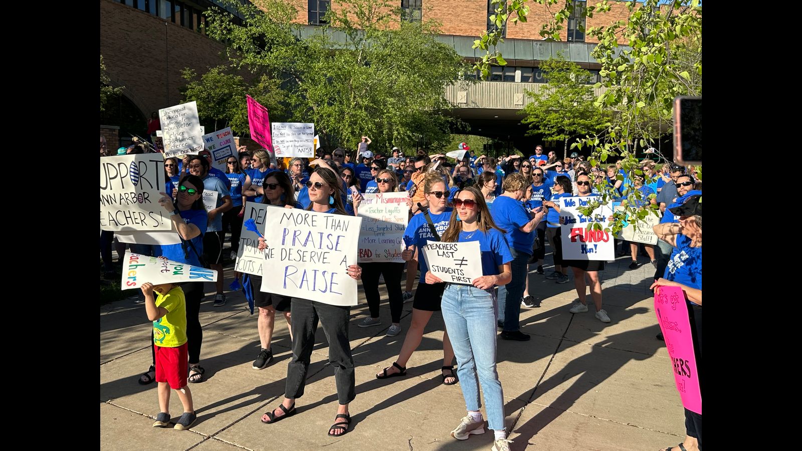 Hundreds of educators protest pay and job cuts at Ann Arbor, Michigan ...